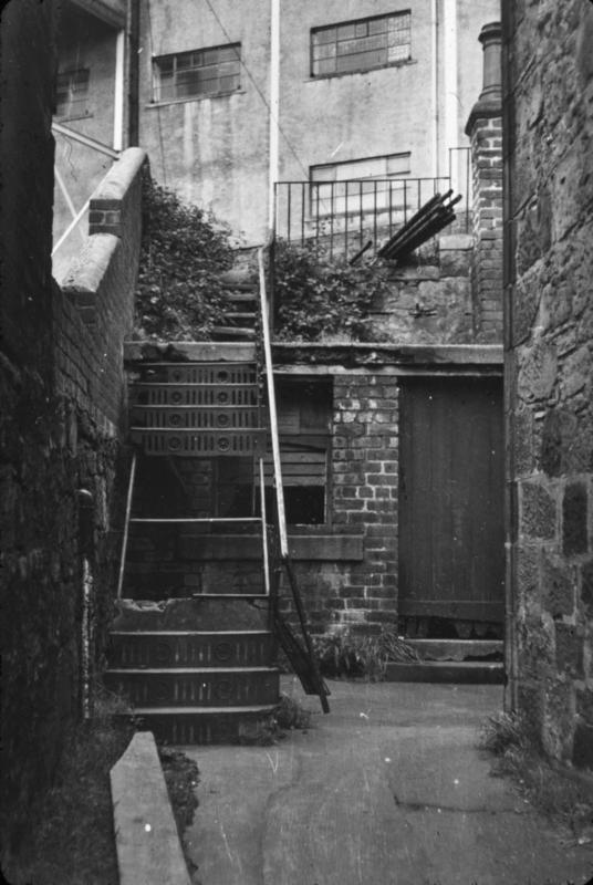 Rear view of Mathieson's Buildings, Howgate, Falkirk with external ...