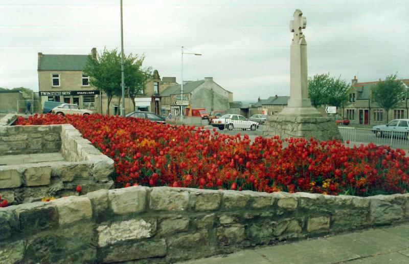 Flower beds behind war memorial, Mary Square, Laurieston - Falkirk Council