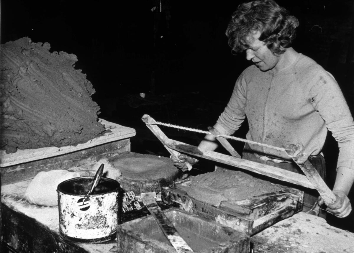 Brickmaking, with a woman worker to the right. - Falkirk Council